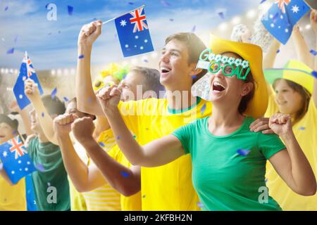 Australia fans on stadium. Australian supporters. Crowd cheering for ...