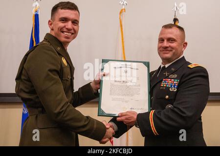 U.S. Army Lt. Col. Seth Allen, left, University of Connecticut ROTC ...