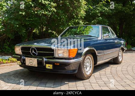 1972 blue Mercedes 350 SL with opened door on driver's side parked in ...