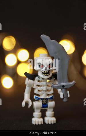 A closeup of a halloween toy skeleton with red eyes Stock Photo - Alamy