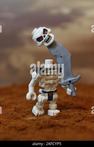 A closeup of a halloween toy skeleton with red eyes Stock Photo - Alamy