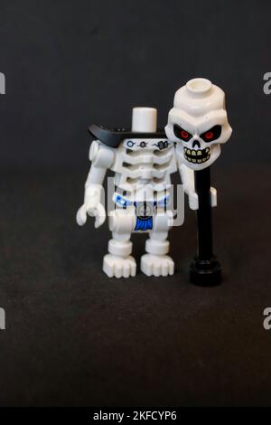 A closeup of a halloween toy skeleton with red eyes Stock Photo - Alamy