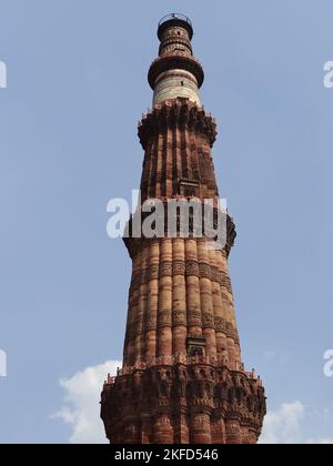 The Qutub Minar's tower ruins in New Delhi, India against a clear sky ...