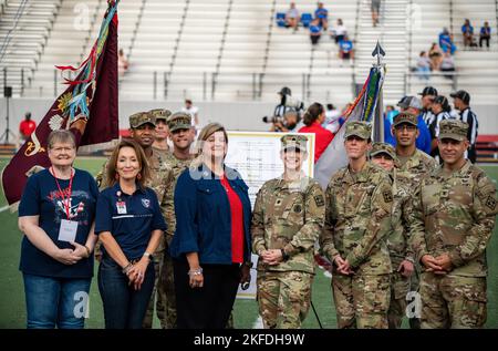 Veterans Memorial High School Principal, Dr. Sue Arredondo, left center, and 232d Medical ...