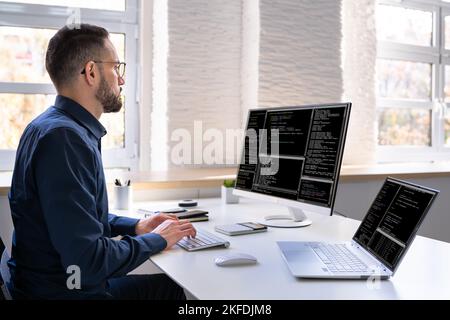 Software Programmer Or Coder Man Using Office Computer Stock Photo - Alamy