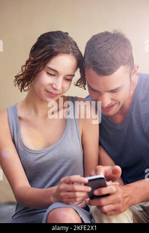 Romantic couple whiling away time together on veranda Stock Photo - Alamy