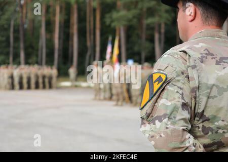 Lt. Col. Derek G. Drouin (l), commander, and Command Sgt. Maj. Jacob D ...