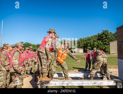 Trainees with Company E, 701st Military Police Battalion, Pfc. Ayden ...
