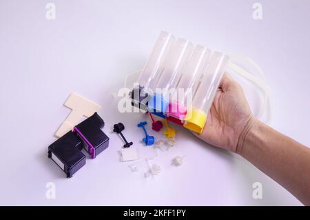Image of equipment for creating ink tanks for printers Stock Photo - Alamy