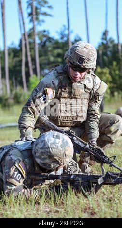 Squad 1, representing Maneuver Center of Excellence, pause for a photo ...