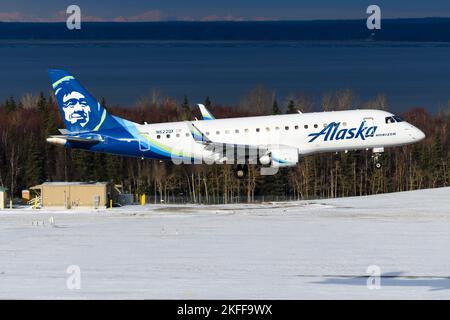 Horizon Air Embraer E175 aircraft landing in Anchorage Airport, a ...