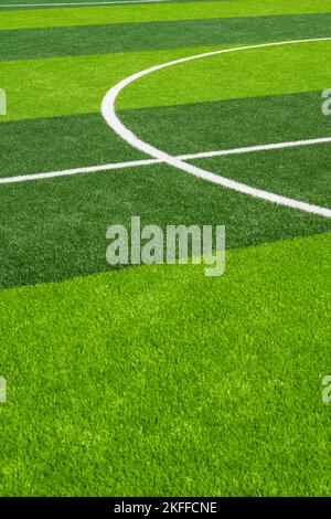 Close-up of the goal and touchline of a brand new football stadium ...