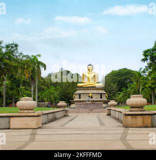 Golden Buddha statue in Viharamahadevi Park in the centre of Colombo ...