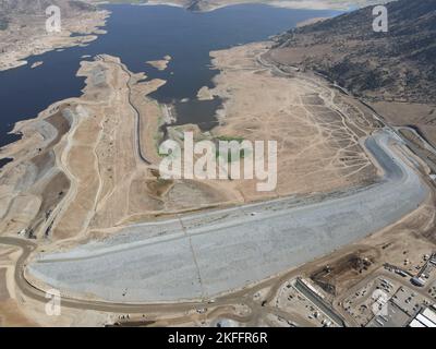 An aerial view of the labyrinth weir, emergency spillway, and service ...