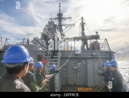 PHILIPPINE SEA (Sep. 14, 2022) Sailors load a torpedo on the aft ...
