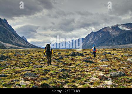 Trekking the Arctic Tundra along the Owl River on the Akshayuk Pass ...