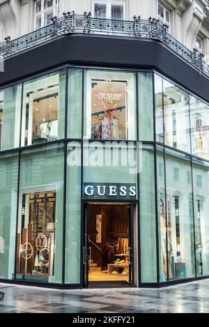GUESS store and people shopping on Regent Street, London, England, UK ...