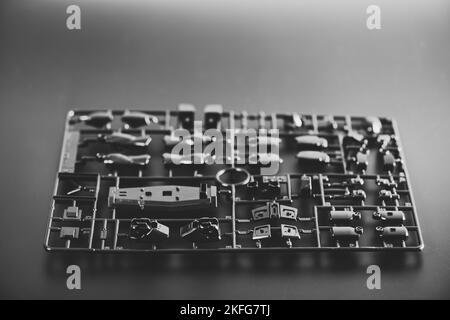 Black plastic sprues or injection moulding of model kit Stock Photo - Alamy