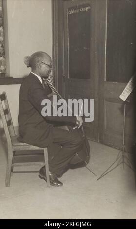 A cello student of the Adult Education Classes under the Federal Music ...