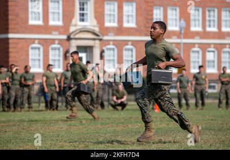 U.S. Marine Corps First Sgt. Robert Etzler, left, first sergeant of ...