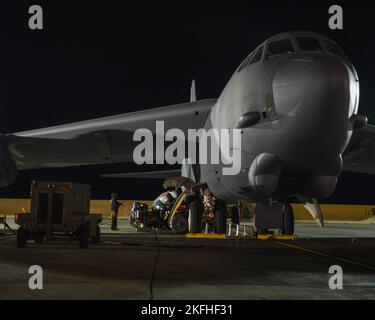 Airmen from the 705th Munitions Squadron load a B-52H Stratofortress ...