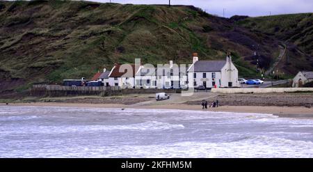 The Ship Inn, which originally dates from the 1500's, and beach at ...