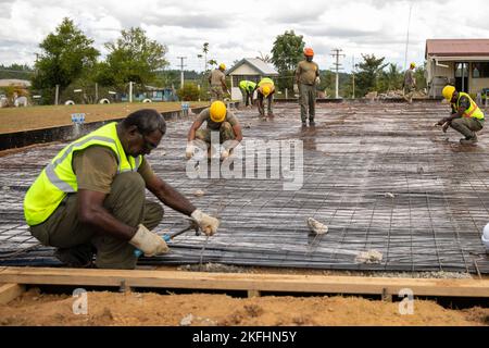 Members of the Royal Fiji Military Force Engineers weld rebar to be ...