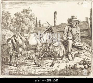 Black german shepherd sitting on green grass, side view Stock Photo - Alamy