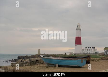 Lighthouse on a cloudy sky background Stock Photo - Alamy