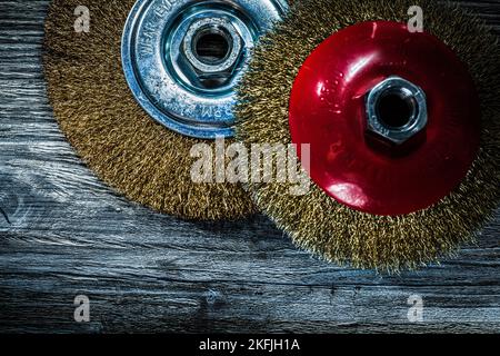 Used brass round brushes on vintage wooden board Stock Photo - Alamy
