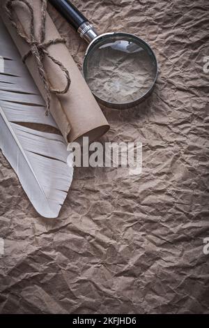 Vintage rolled paper on crumpled wrapping sheet Stock Photo - Alamy