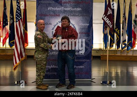 Col. Andy Nuce presents David Parry Department of the Army Civilian ...