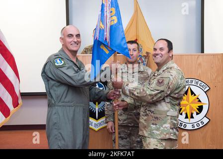 Col. William Liess, 108th Operations Group commander, speaks during a ...
