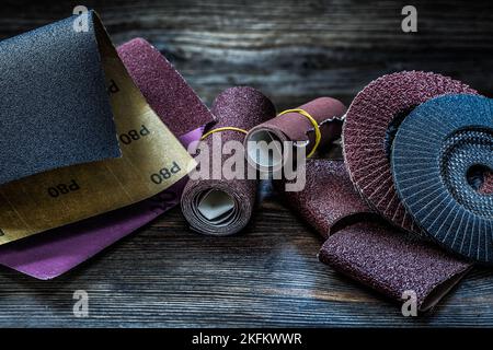 Set of abrasive tools on vintage wood background Stock Photo - Alamy