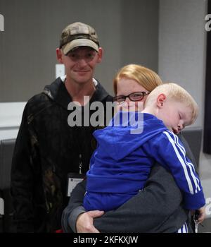 U.S. Army Reserve Sgt. Joshua Beavers smiles as his wife, Jessica ...