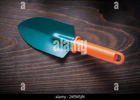 Hand gardening spade on vintage wood board agriculture concept Stock ...