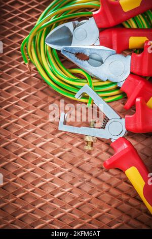 Insulation strippers electric cable cutter pliers on dielectric mat ...