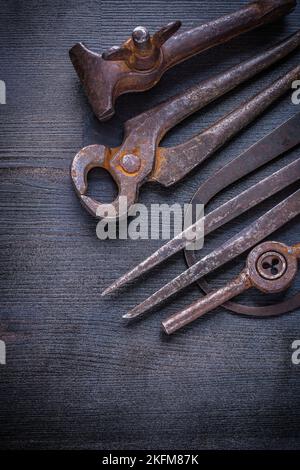 Old threading tools on dark background, close-up Stock Photo - Alamy