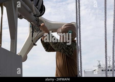 An Improved Navy Lighterage System (INLS) causeway ferry approaches the ...