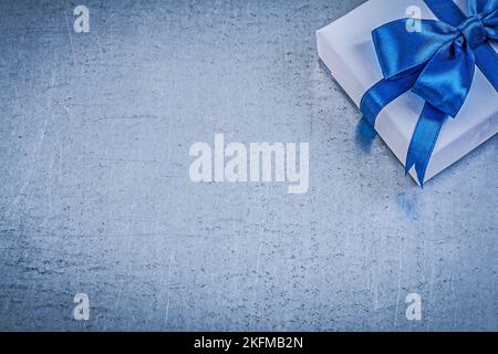 Present box blue bow on metallic background copyspace celebrations ...