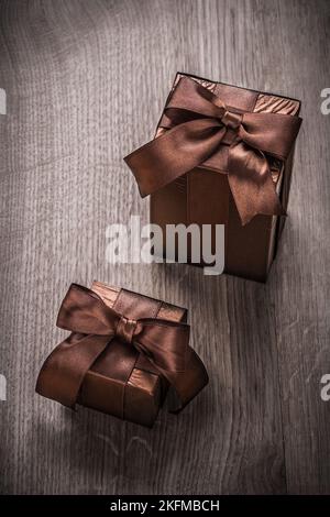 Present boxed in glittery crumpled paper with bow celebration concept ...