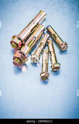 Vertical view anchor bolts for concrete walls and nuts on metallic ...