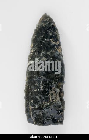 Neolithic obsidian arrowhead on white background Stock Photo - Alamy