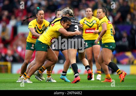 New Zealand's Apii Nicholls (left) jumps highest to collect the ball ...