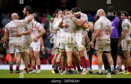 Georgia's players celebrate victory at the final whistle after the ...