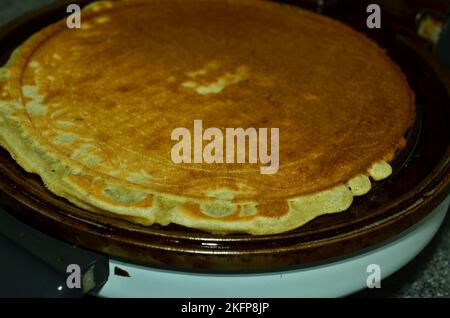 a wafer baked from paste in a waffle iron Stock Photo - Alamy