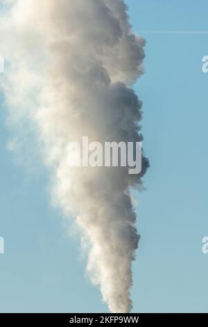 Column of smoke coming out of an industrial chimney. France Stock Photo ...
