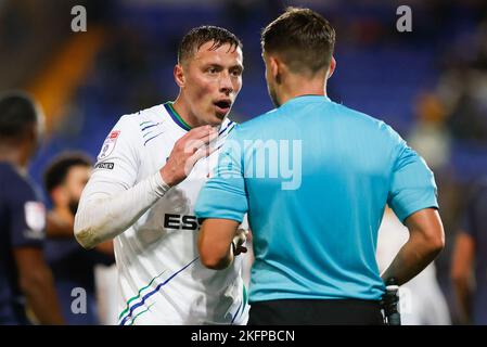 Referee, Tom Kirk gestures during the Everton v Wolverhampton Wanderers ...