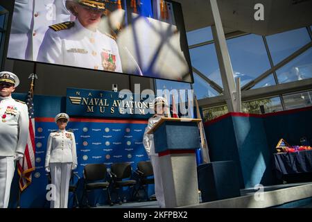Capt. Kimberly P. Toone reads her orders as she assumes command during ...