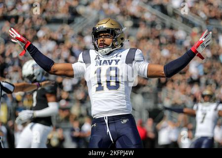 Navy safety Rayuan Lane III (18) tackles Delaware wide receiver ...